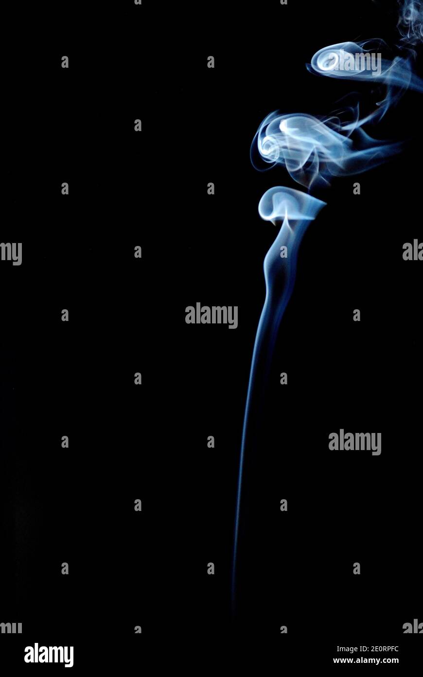 smoke heavily swirled right with black background Stock Photo - Alamy