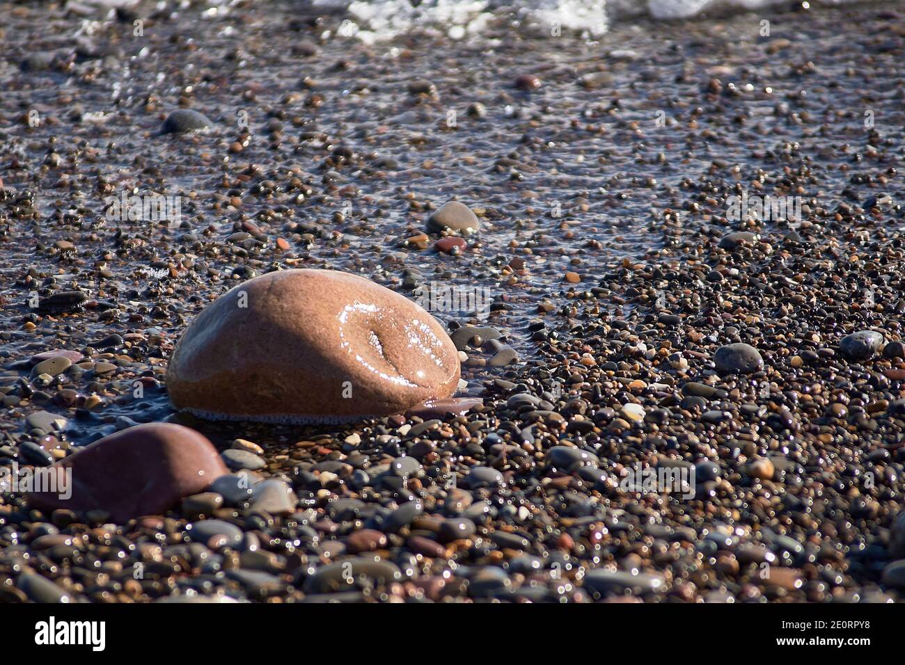 Set of rocks on the shore of the beach, unfocused background, nobody ...