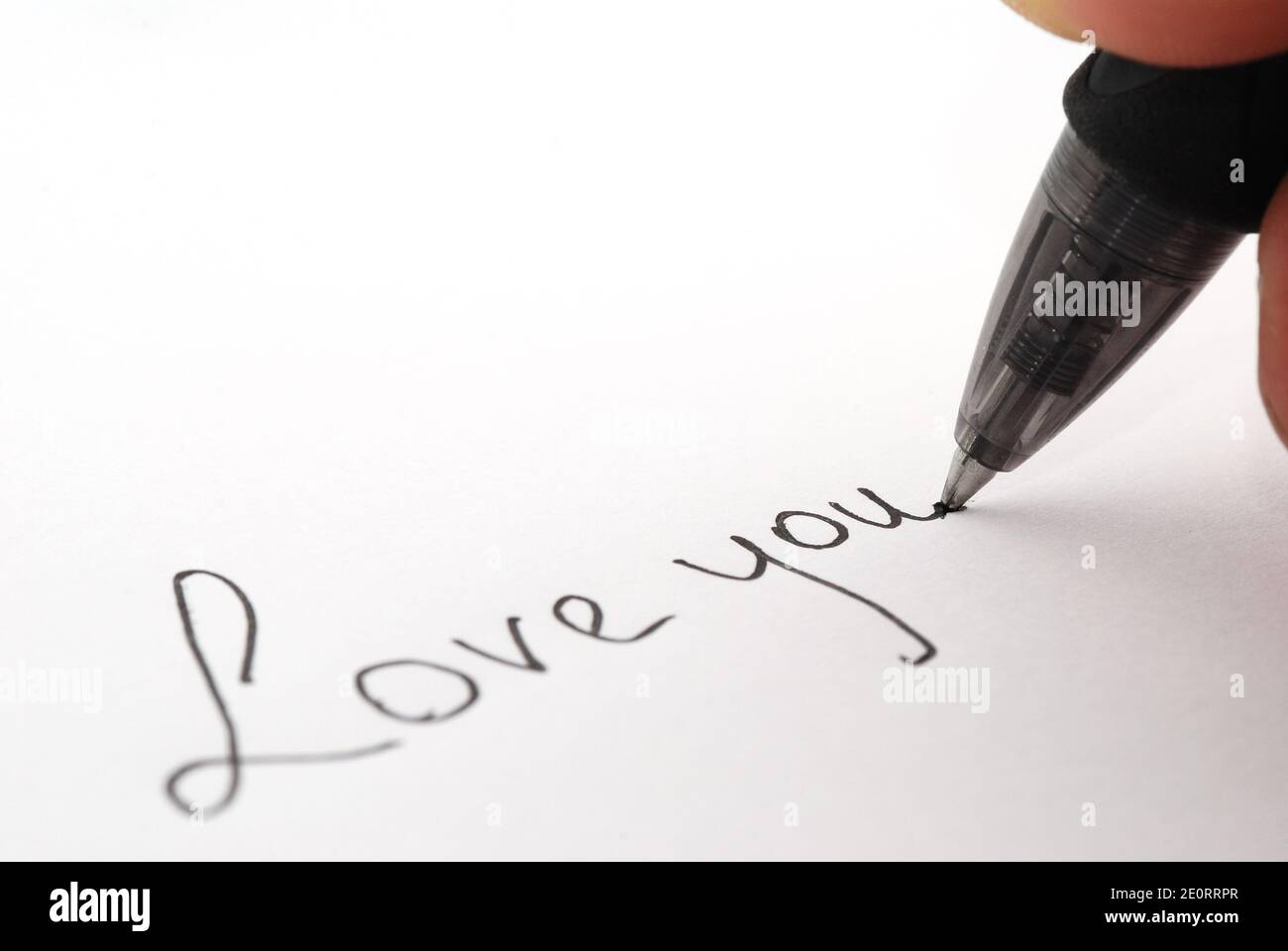 love you written on a white letter view side Stock Photo - Alamy