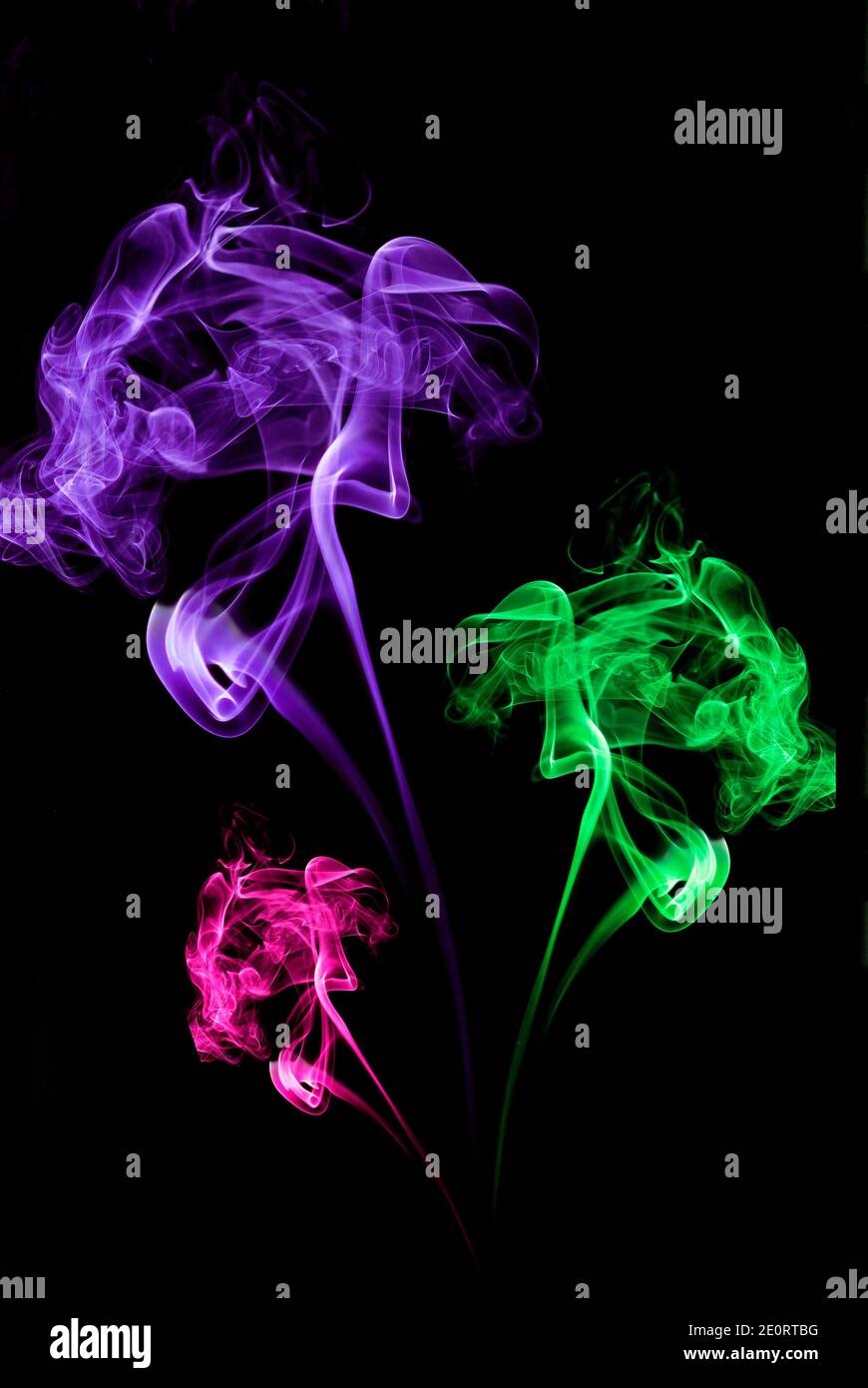colorful bouquet of multi colored smoke on black background Stock Photo ...