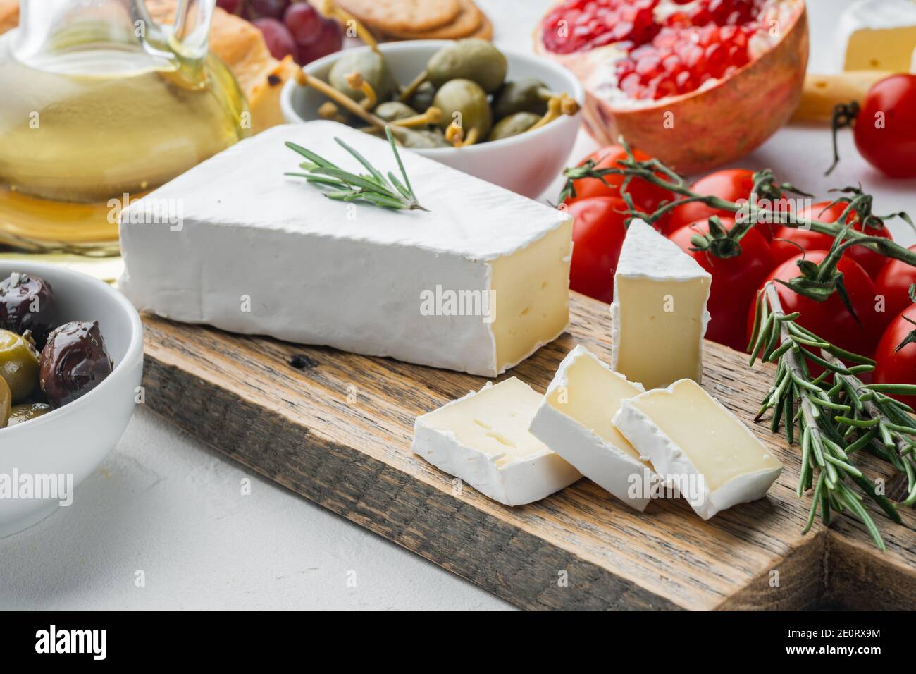 Brie type of cheese set, on white background Stock Photo - Alamy