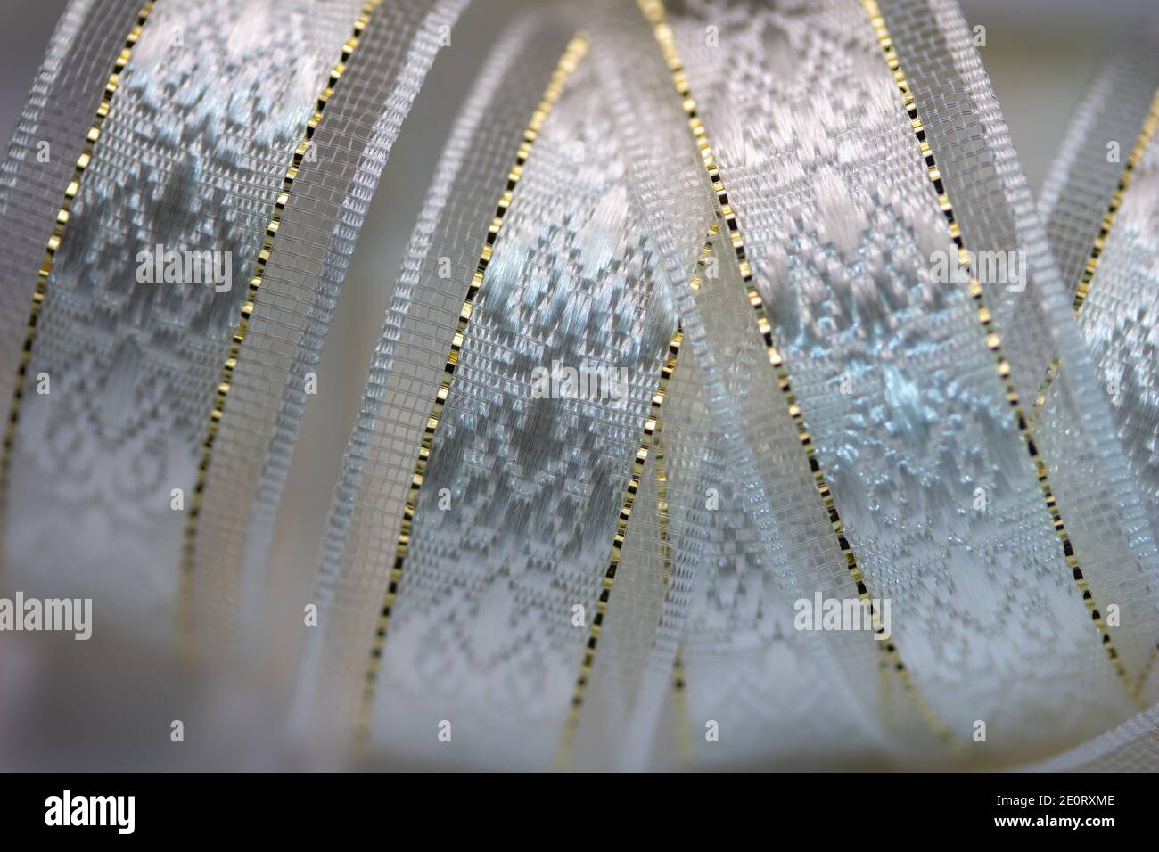 Macro defocused full frame texture abstract of shimmering silvery white ...