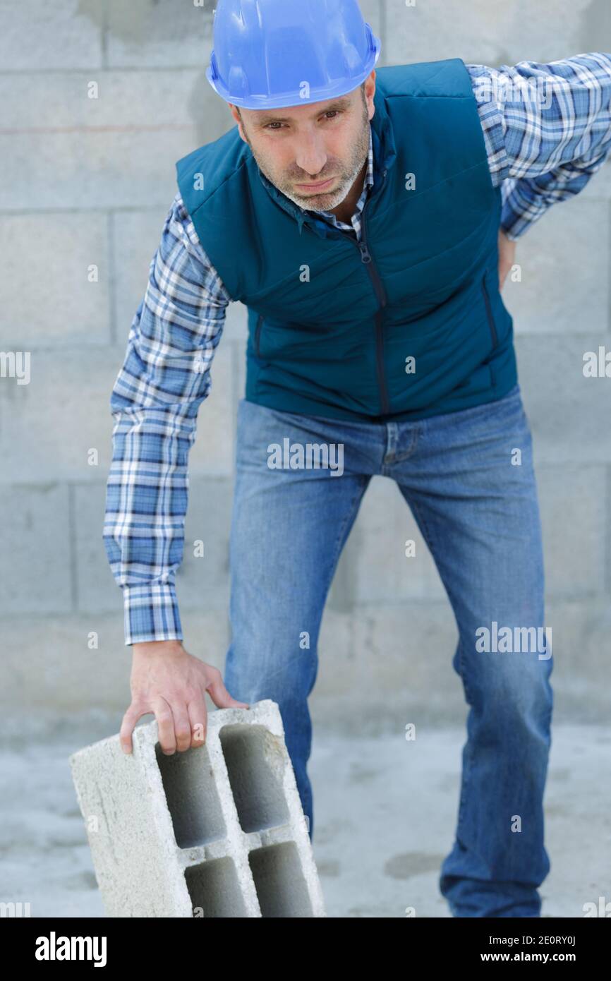 construction worker getting back injury Stock Photo - Alamy construction worker getting back injury Stock Photo - Alamy