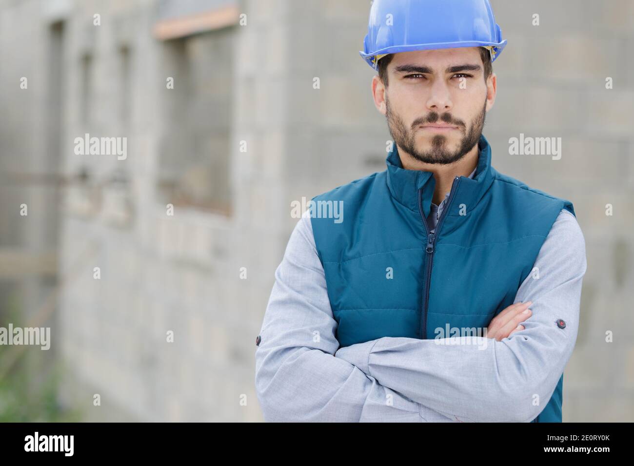 portrait of a serious workman Stock Photo - Alamy