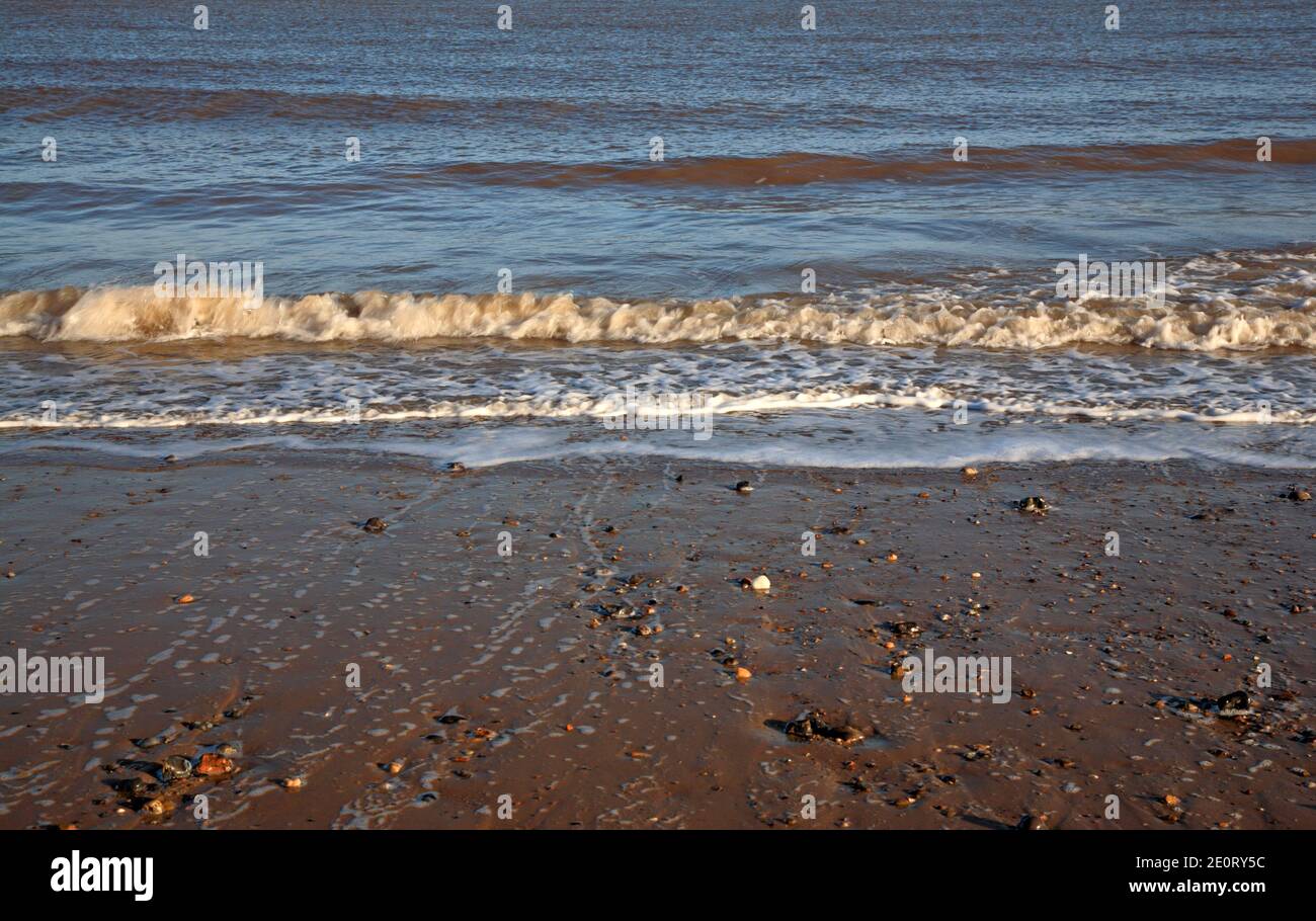 Wavelets on shore hi-res stock photography and images - Alamy