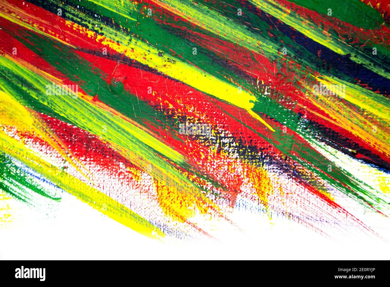 Background from different strokes of red, yellow, green and blue paint ...