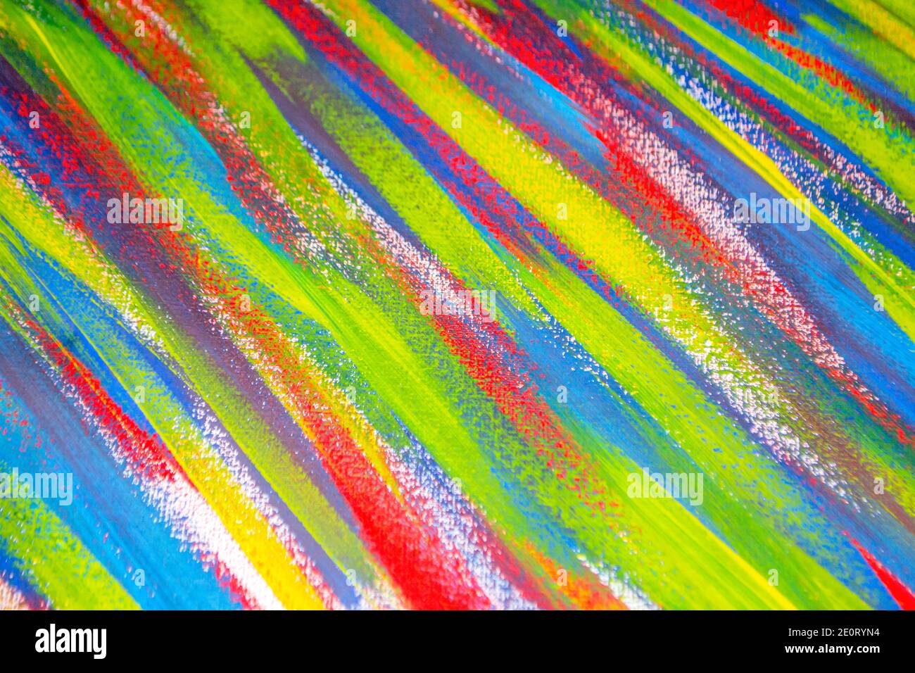 Background from different strokes of red, yellow, green and blue paint ...