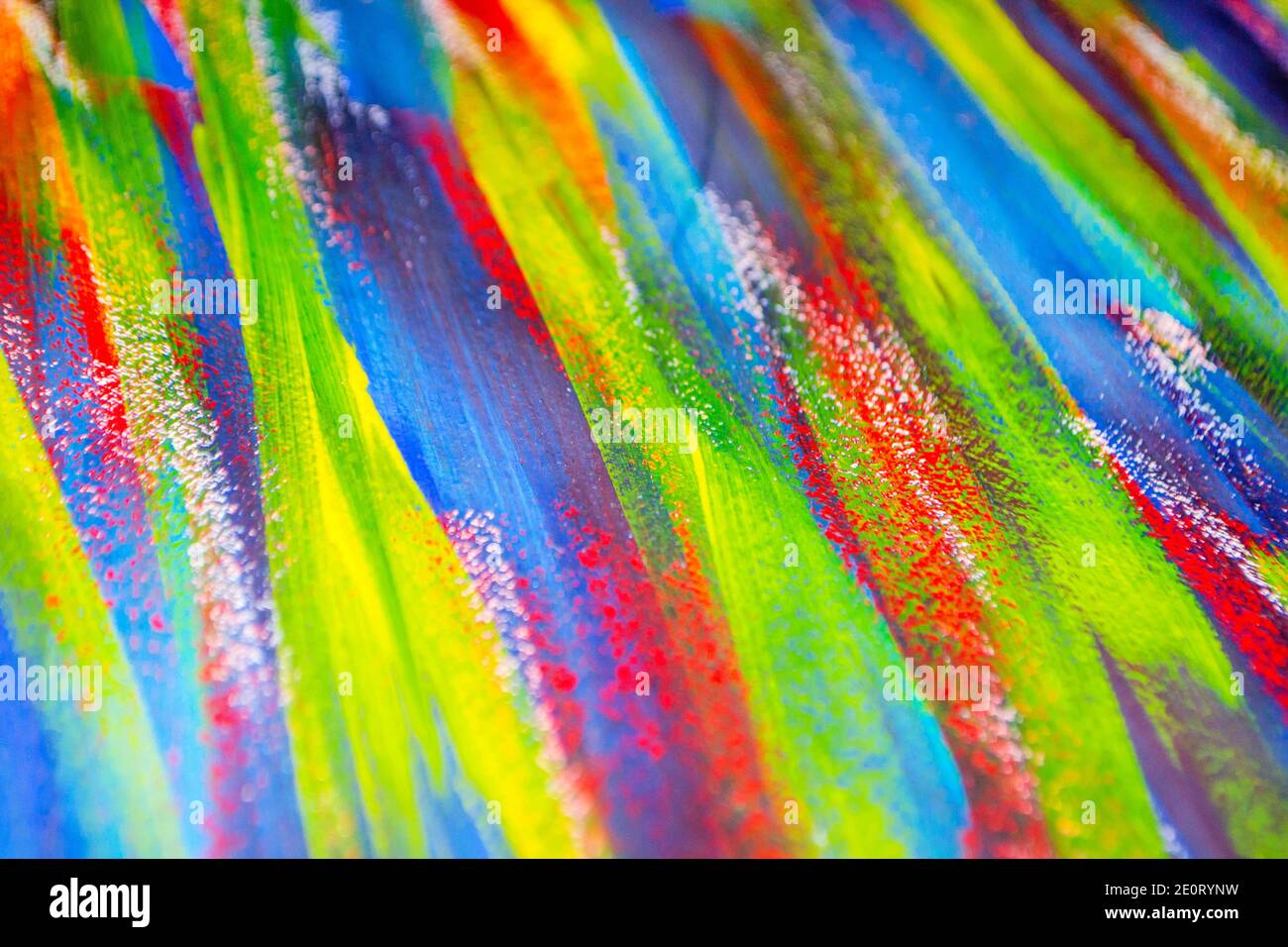 Background from different strokes of red, yellow, green and blue paint ...