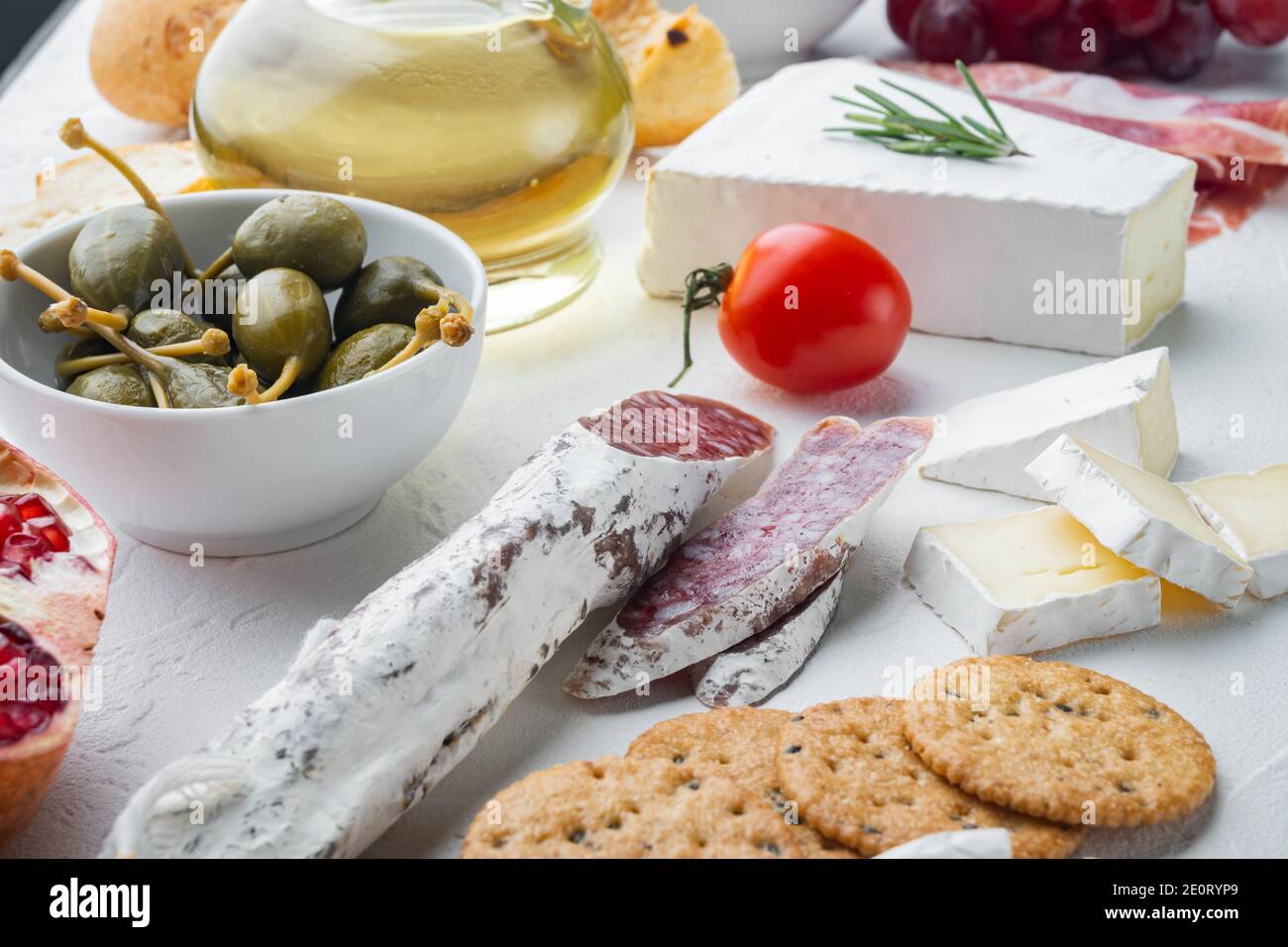 Italian snacks, meat cheese, herbs set, on white background Stock Photo ...
