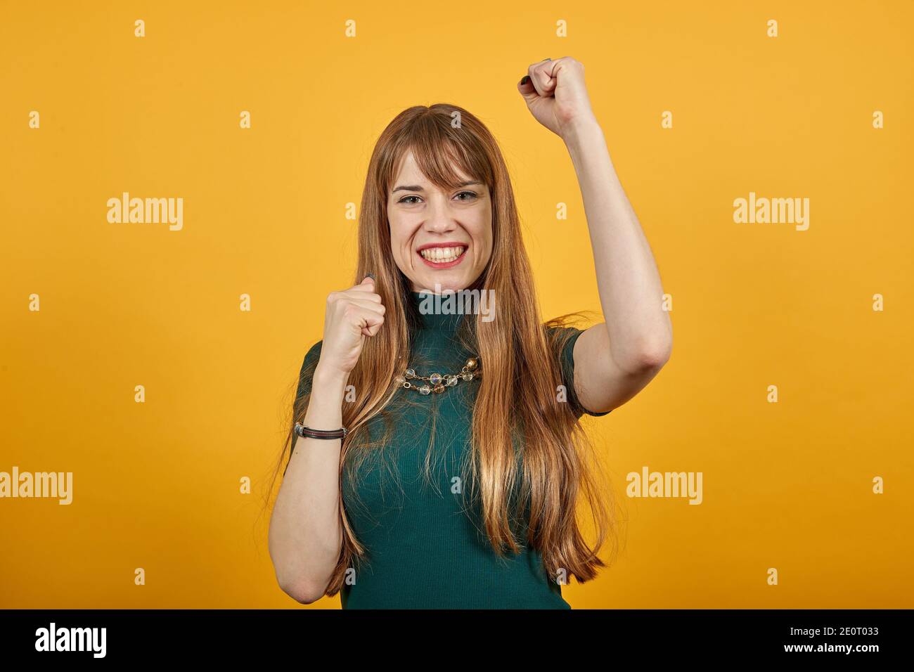 Excited young celebrating win, showing yes gesture, rejoicing success ...