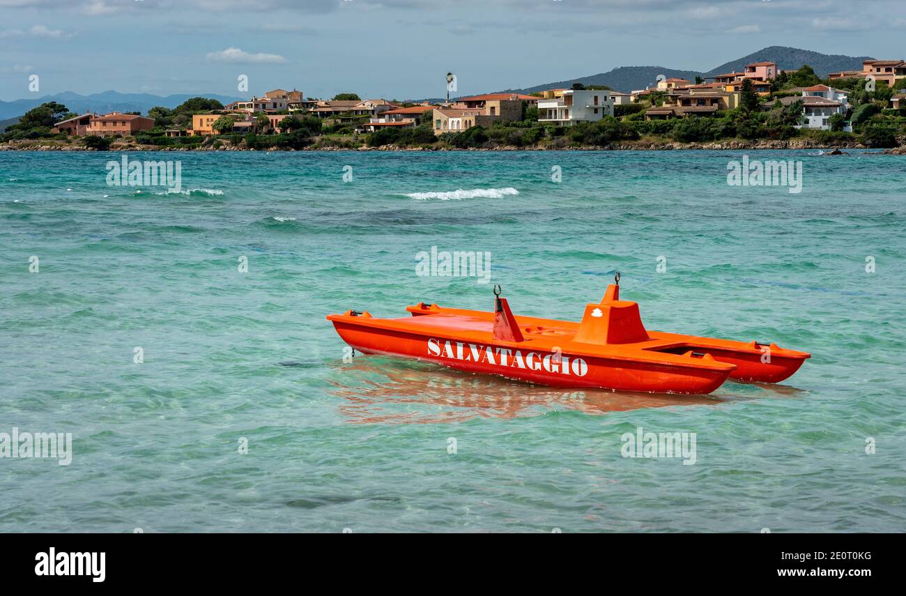 Red Lifeboat In The Sea In Sardinia, Italy Stock Photo - Alamy