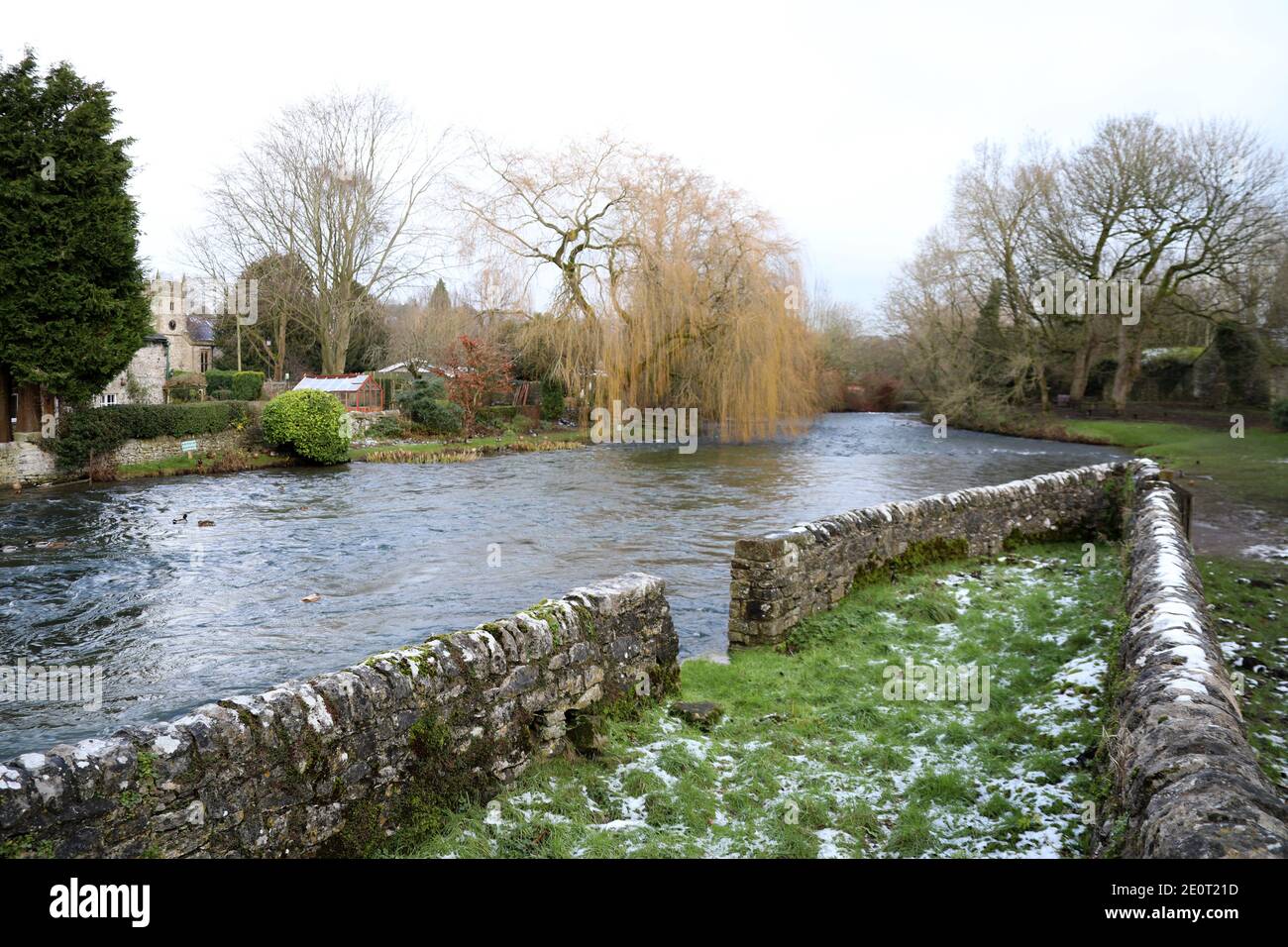Historic stone sheepwash by the packhorse bridge at Ashford in the ...