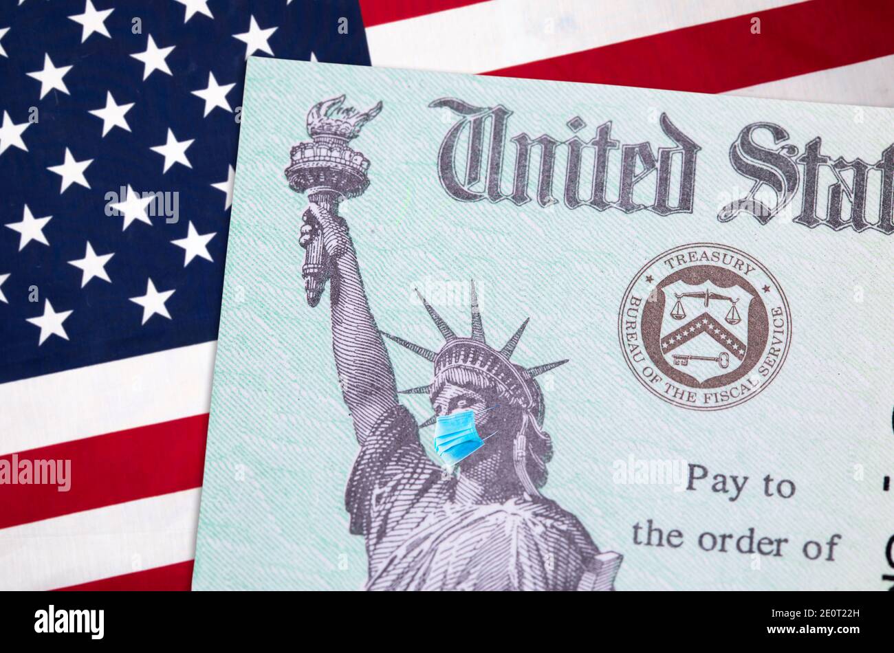 United States IRS Stimulus Check with Statue of Liberty Wearing Medical ...