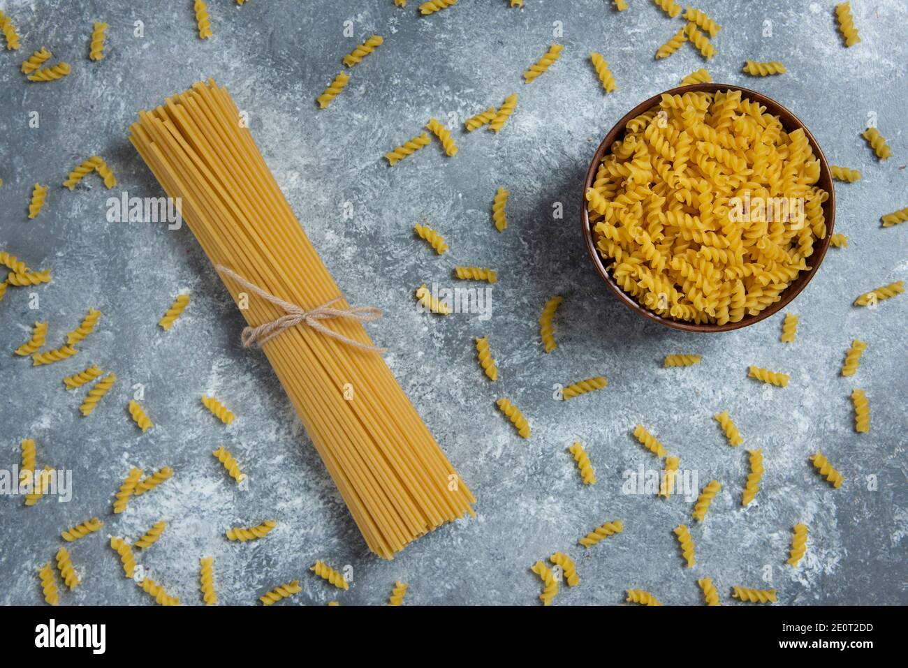 Different types of raw macaroni on a marble background Stock Photo - Alamy
