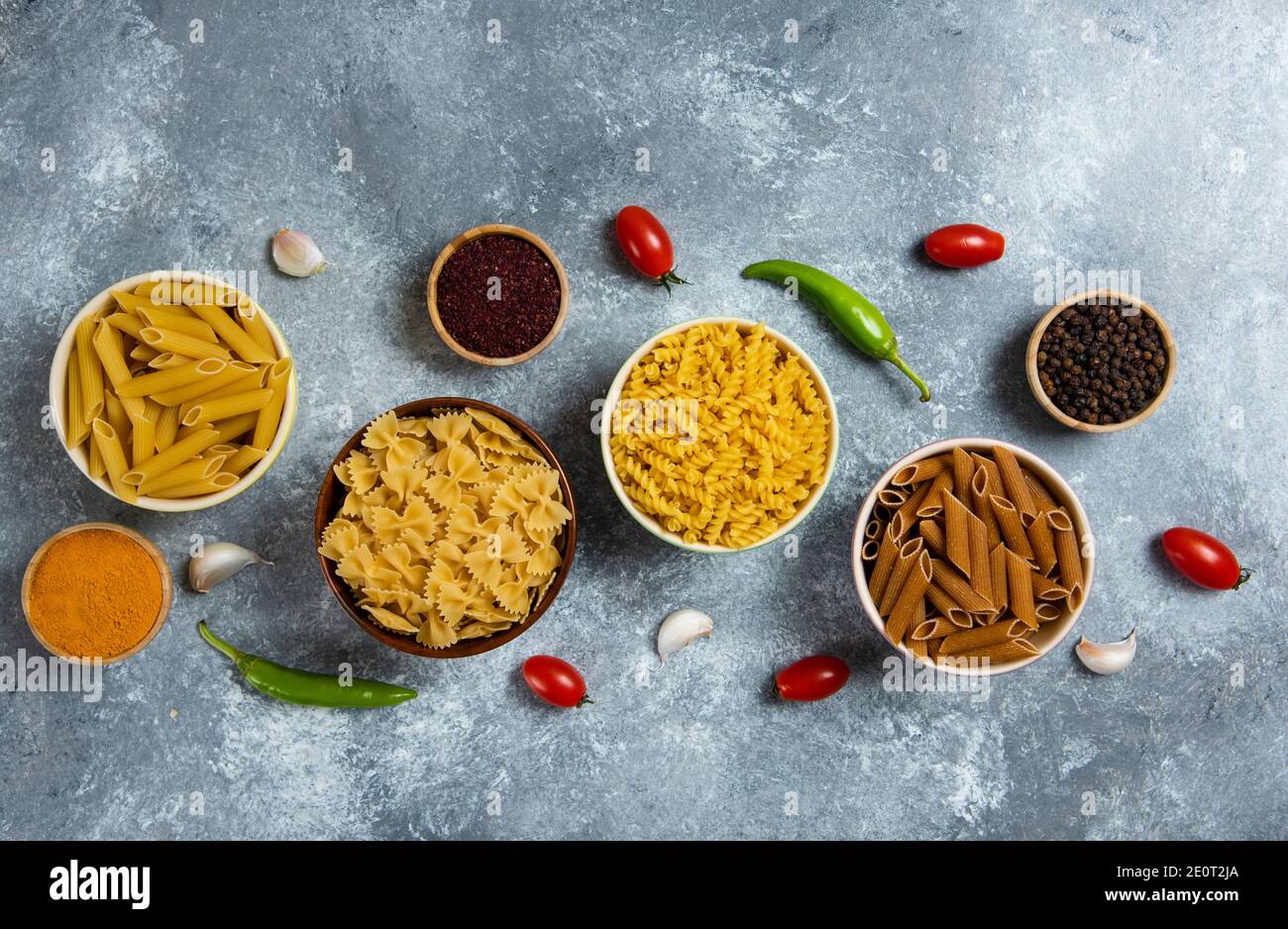 Different types of raw macaroni and vegetables Stock Photo - Alamy