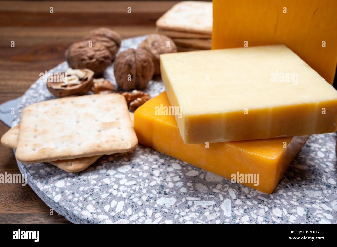 Cheese collection, orange and yellow smoked British cheese from England ...