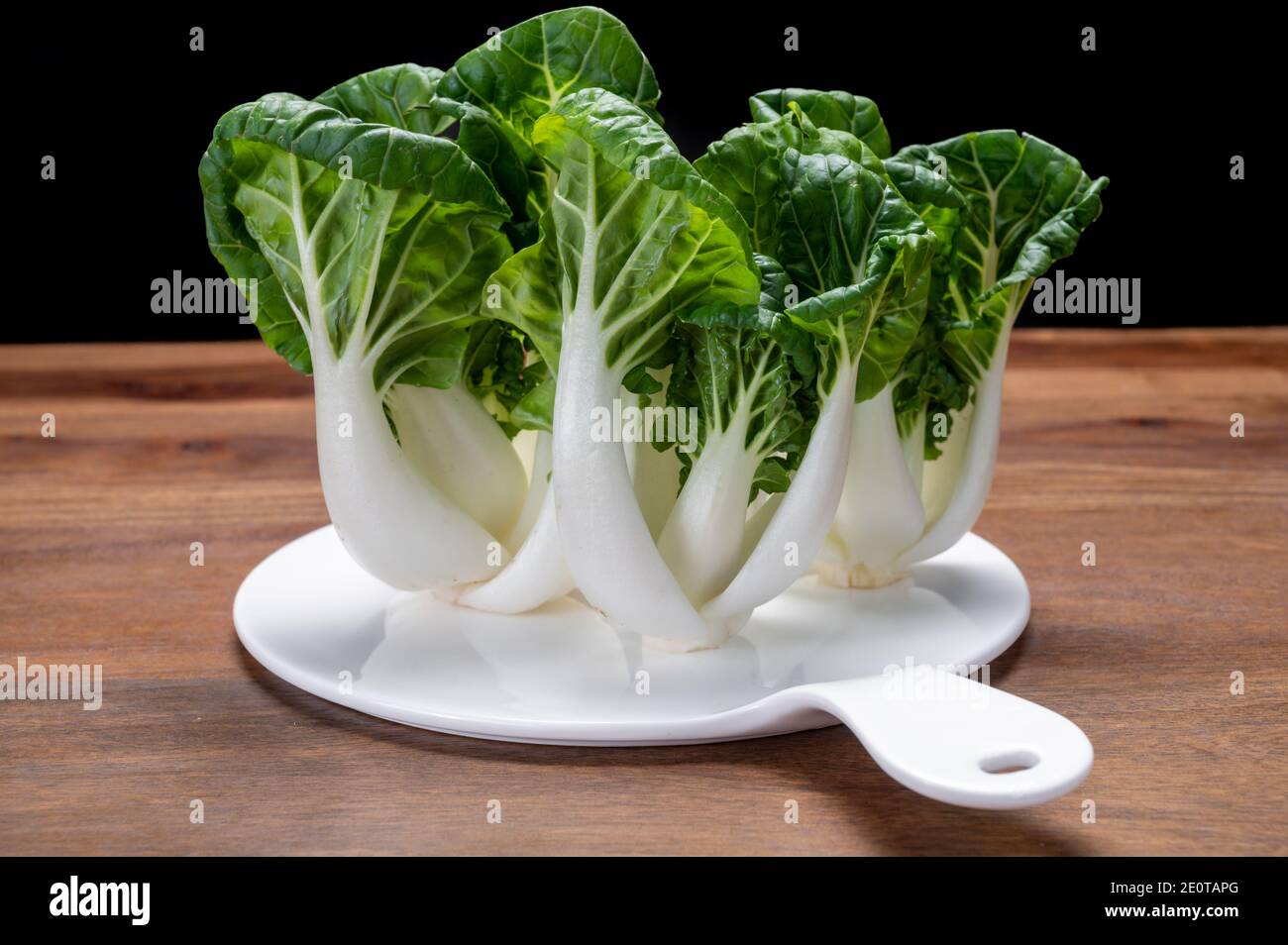 Young organic white bok choy or bak choi Chinese cabbage ready to cook ...