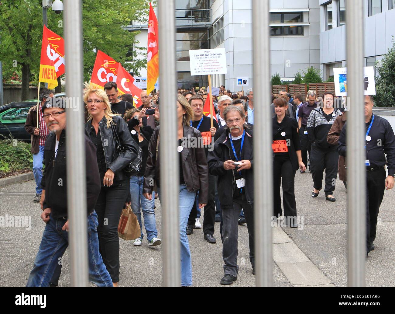 Employees of the Merck Serono Meyzieu plant demonstrate outside the ...