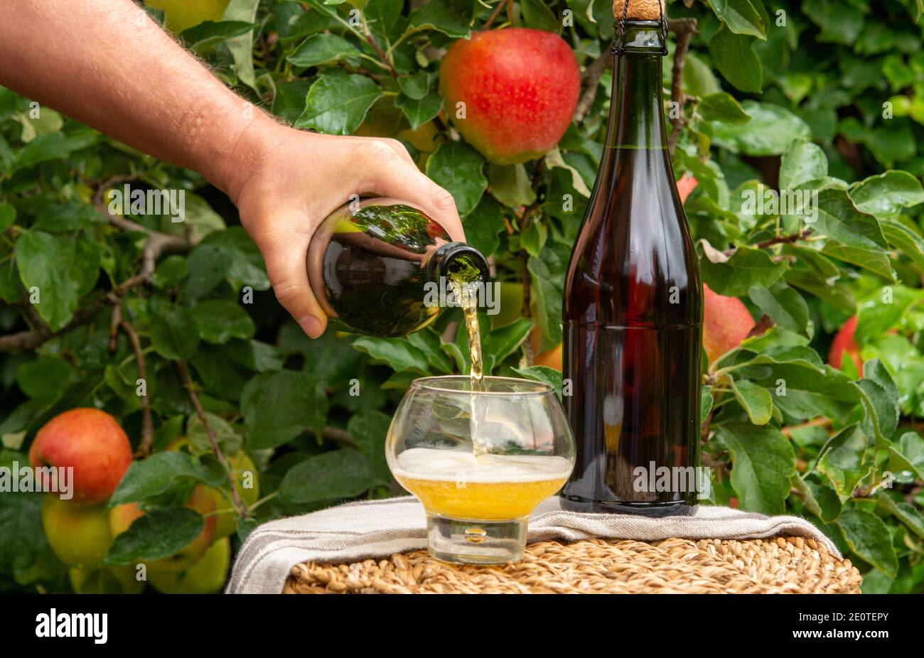 Cider pouring apple tree hi-res stock photography and images - Alamy