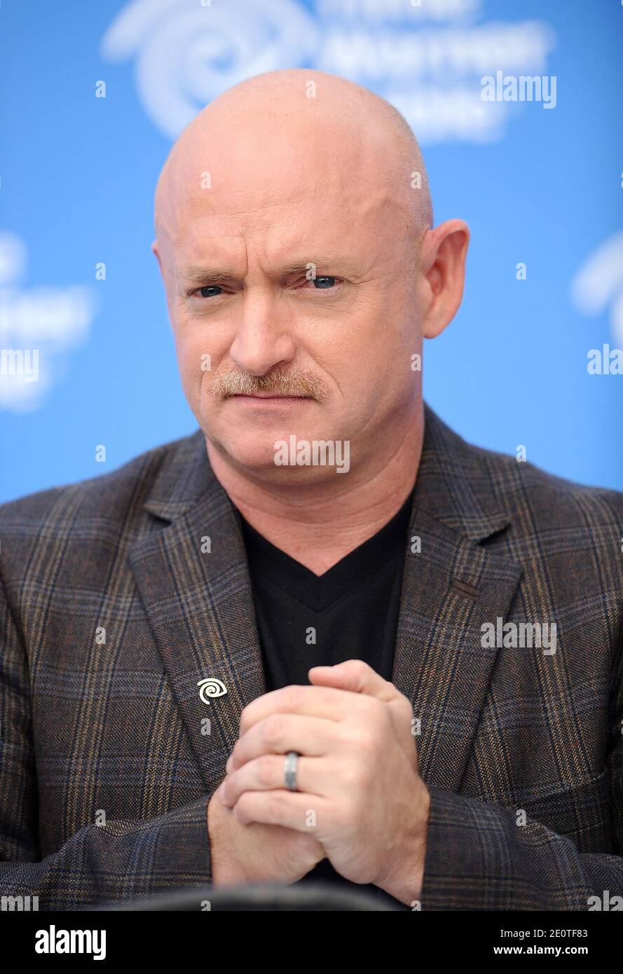 The commander of the space shuttle Endeavour, Captain Mark Kelly holds ...