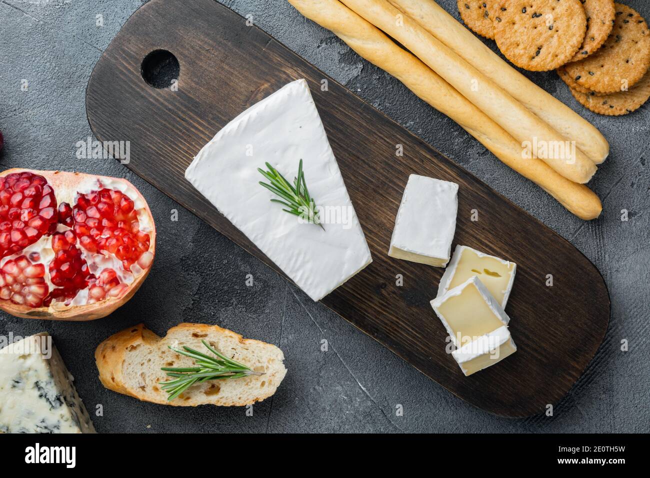 Delicious brie cheese piece, on gray background, top view Stock Photo ...
