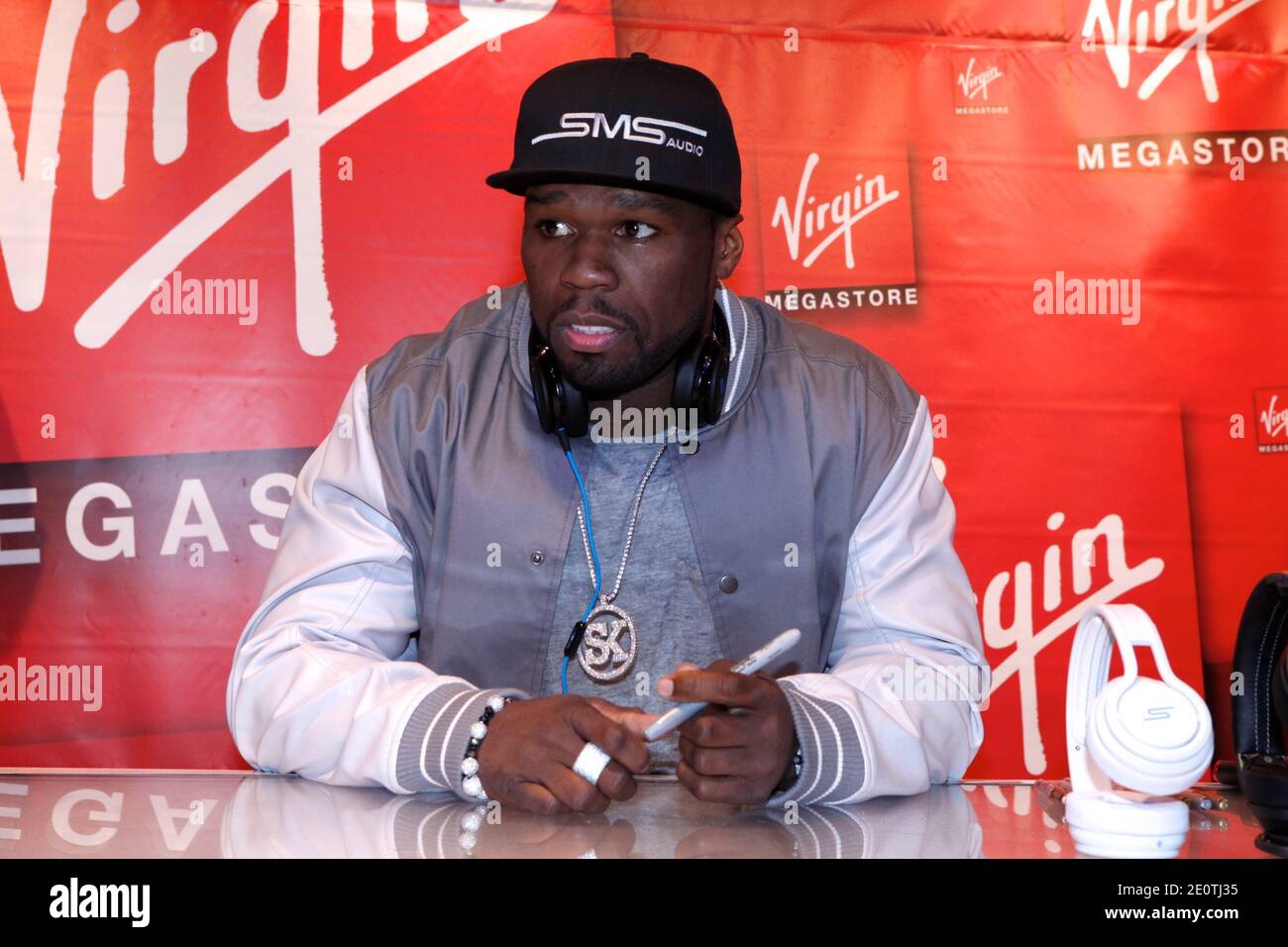 US Rapper 50 Cent signs autographs at a promotion event for his ...
