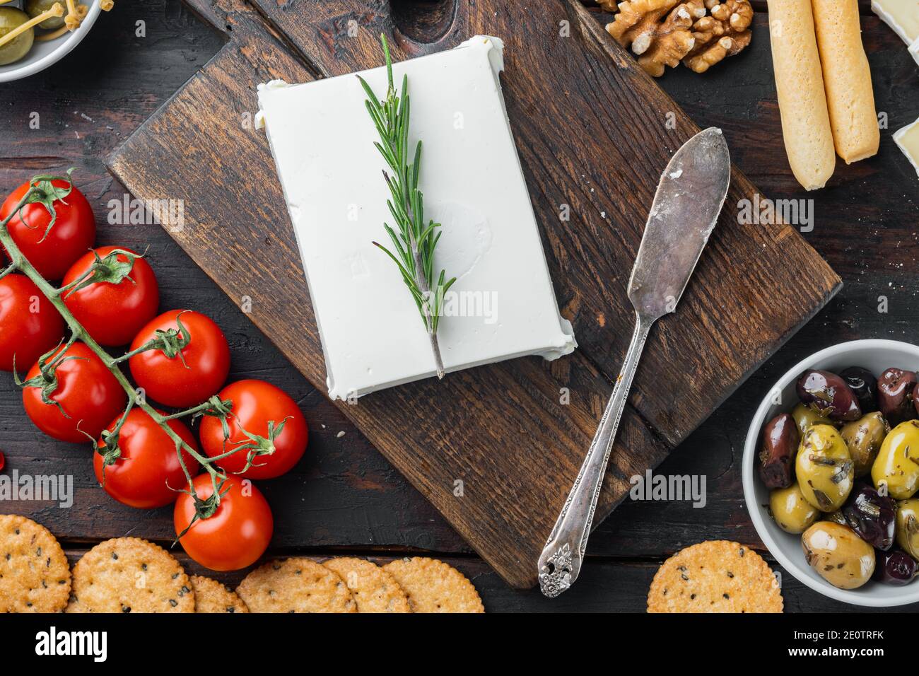 Cheese feta greek salad ingredient, on dark wooden background, flat lay ...