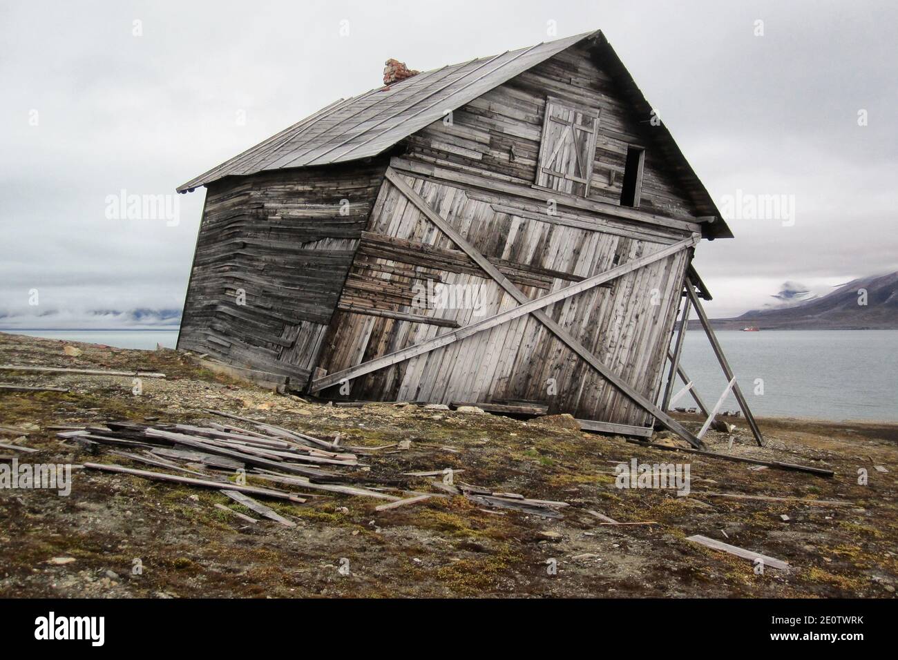 Old Crooked Wooden Hut At Svalbard Coast Stock Photo - Alamy
