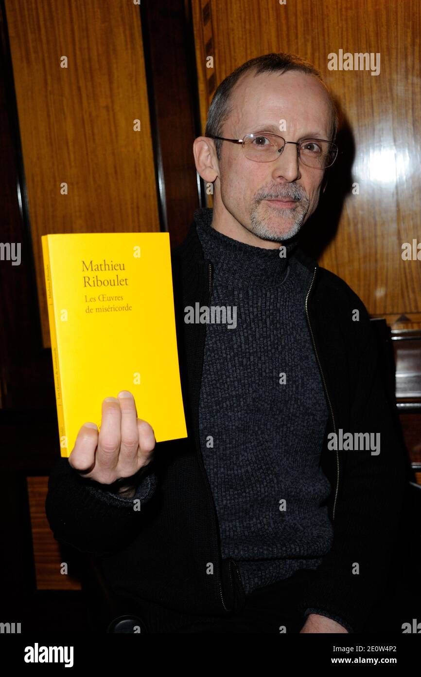Mathieu Riboulet pose after being awarded the Prix Decembre 2012 French ...