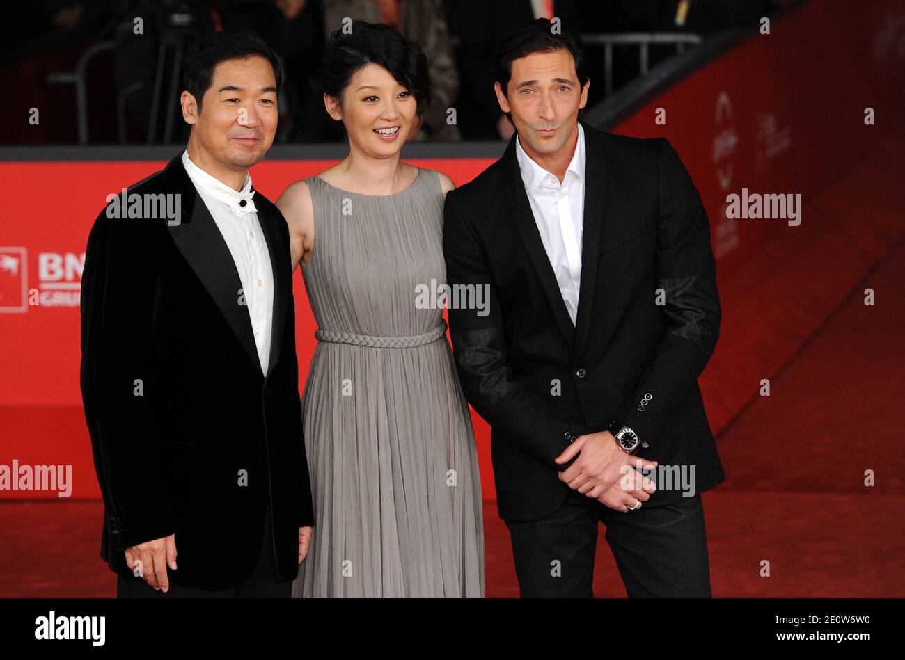 Actors Zhang Guo Li, Xu Fan and Adrien Brody attend the Back To 1942 Premiere during the 7th ...
