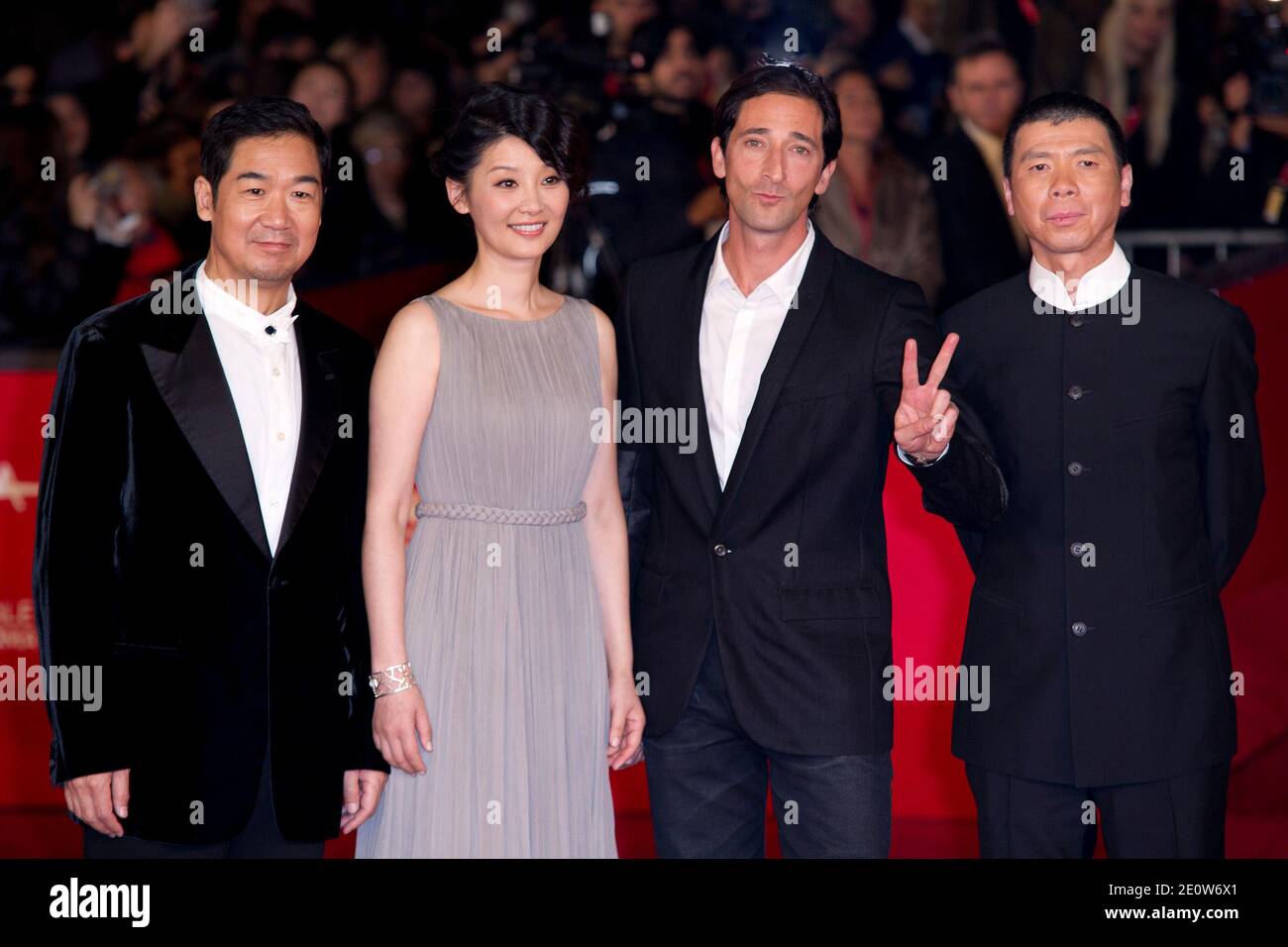 Zhang Guo Li, Xu Fang, Adrien Brody and Feng Xiaogang attending the Back To 1942 Premiere during ...
