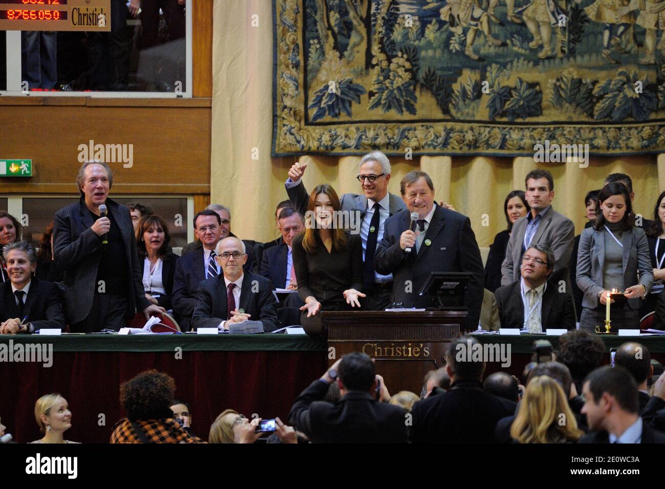 Carla Bruni-Sarkozy, Guy Roux and Jean-Paul Scarpita attending the ...