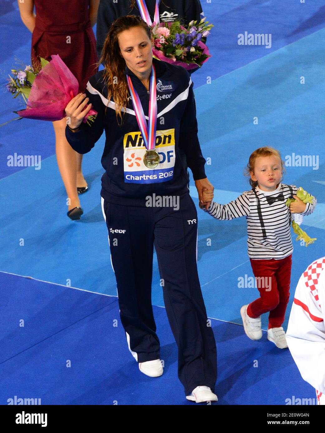 Laure Manaudou and her daughter Manon during the European short course ...