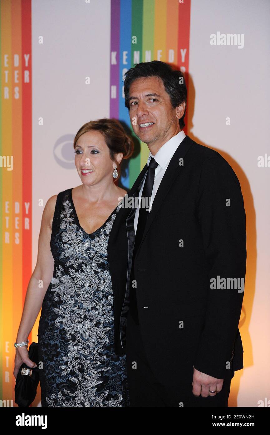 Ray Romano and wife Anna Romano pose for photographers during the 35th ...