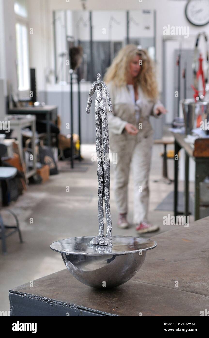 French artist Nathalie Decoster and her sculpture "Culbuto," a nod to ...