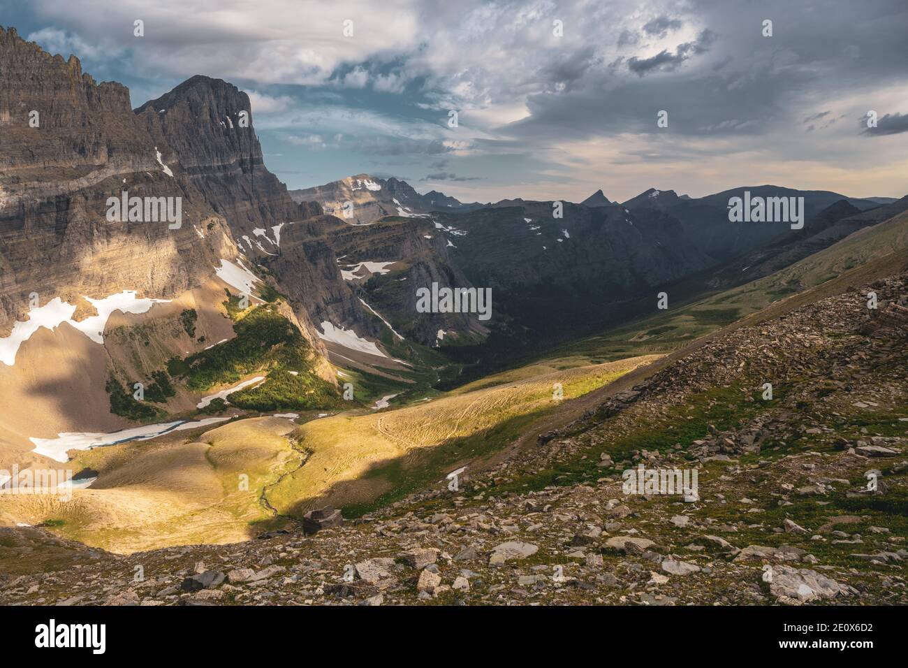 Light Shining Down On The Trail to Many Glacier from Piegan Pass in ...