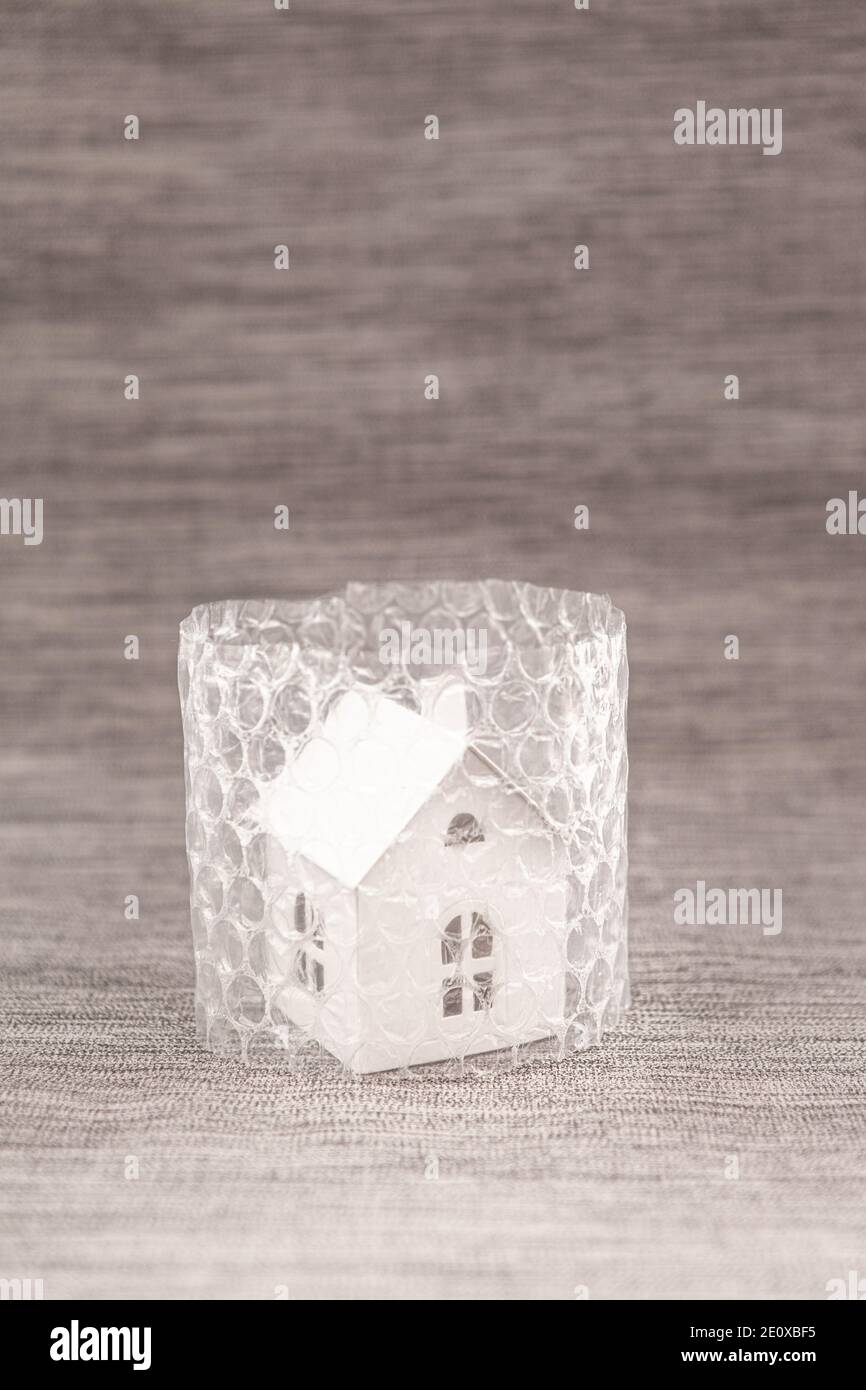 Little House In Bubble Wrap Stock Photo - Alamy