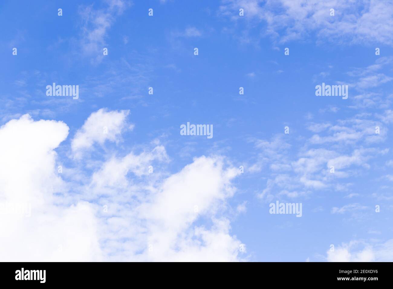 Clear blue color sky with white cloud background Stock Photo - Alamy
