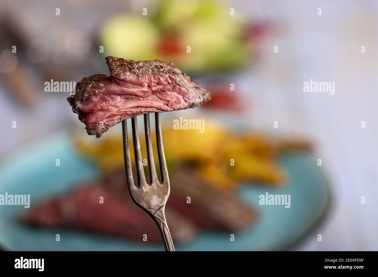 Steak On A Fork Stock Photo - Alamy