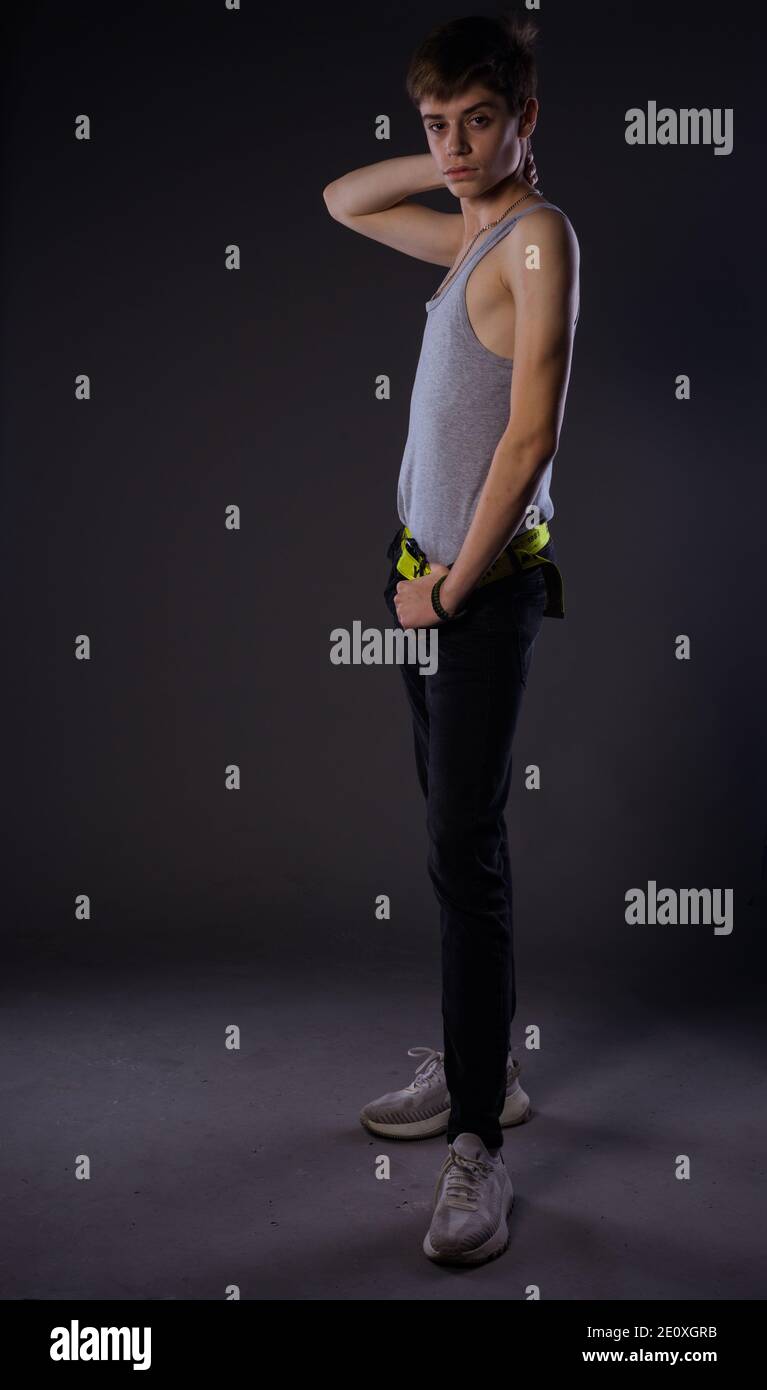 Full body shot of a trendy young man wearing modern style clothes Stock ...