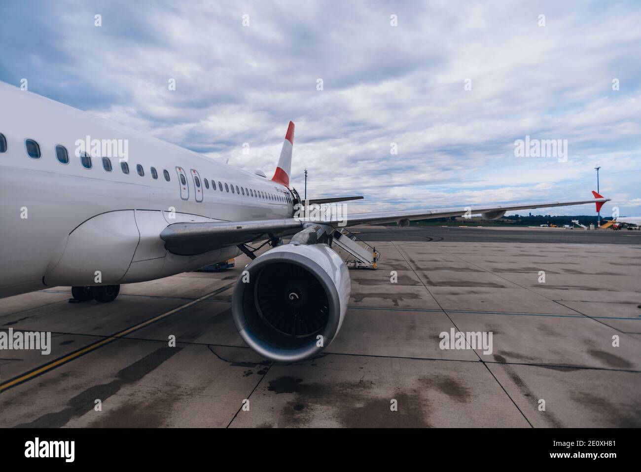 Big jet engine turbine of a big airplane at an international airport ...