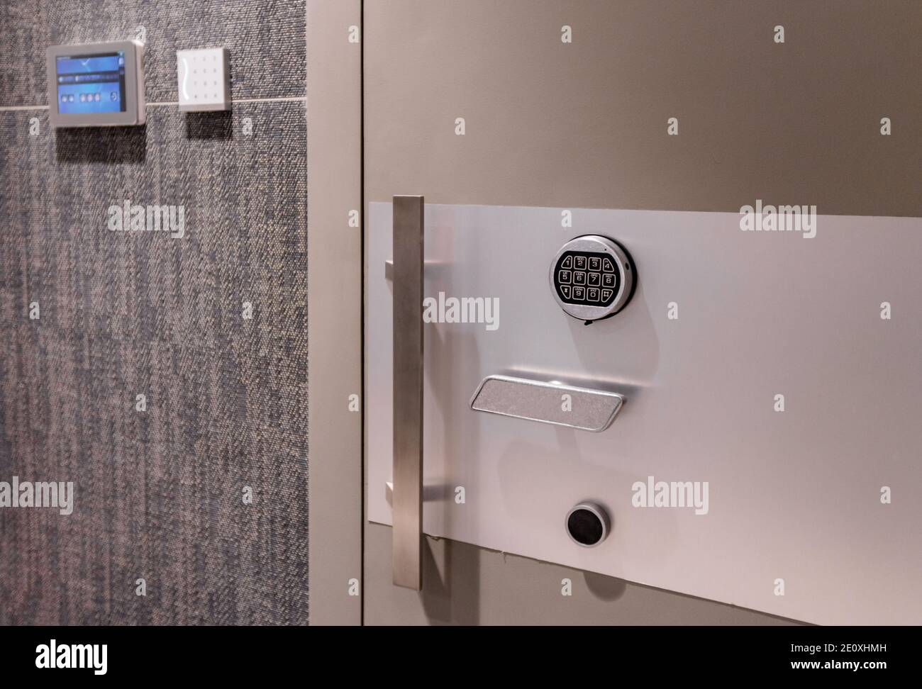 Large metal safe door with multiple access control devices for opening ...