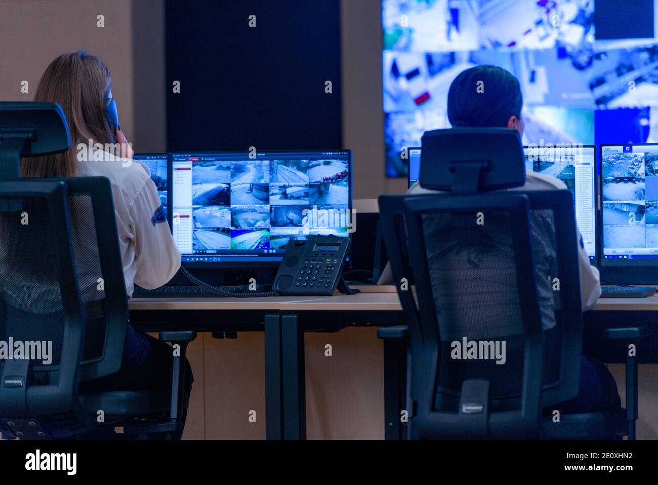 In the System Control Room, Technical Operator Works at His Workstation ...