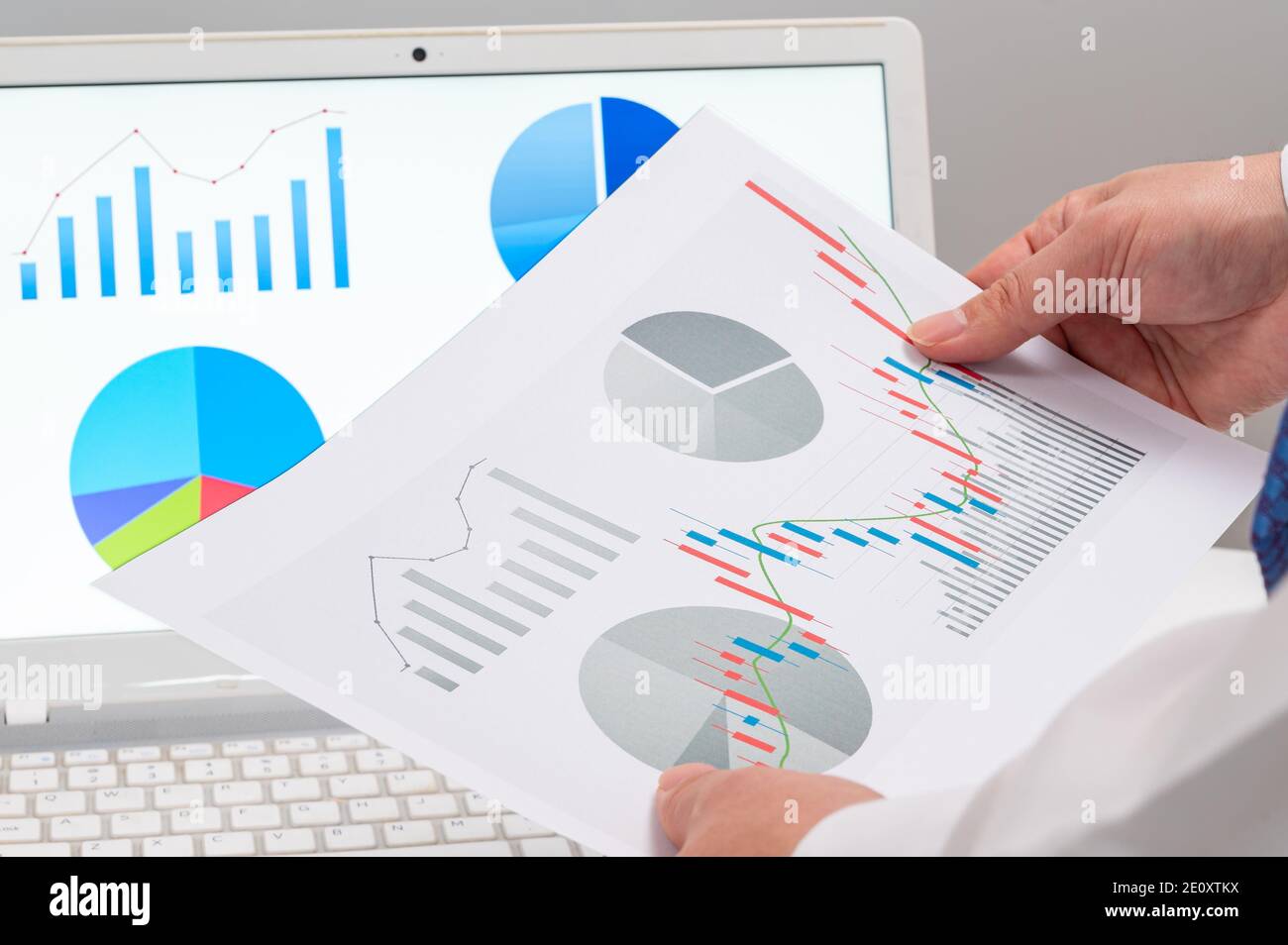 Workplace businessman. Charts, and graphs on the desk. Business ...