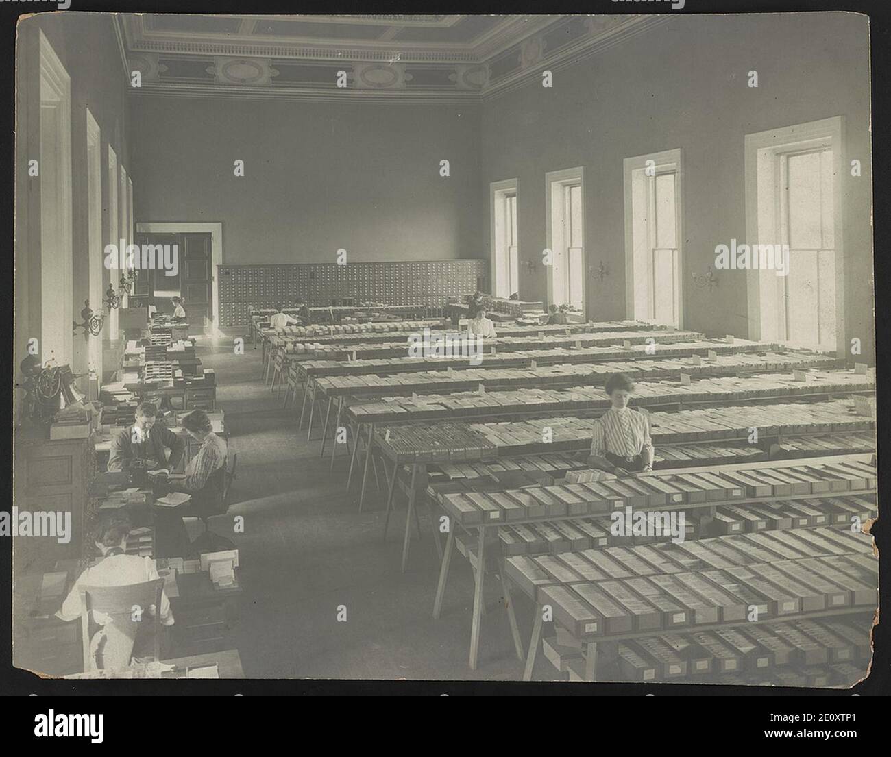 Library of Congress staff working at desks and long tables Stock Photo ...