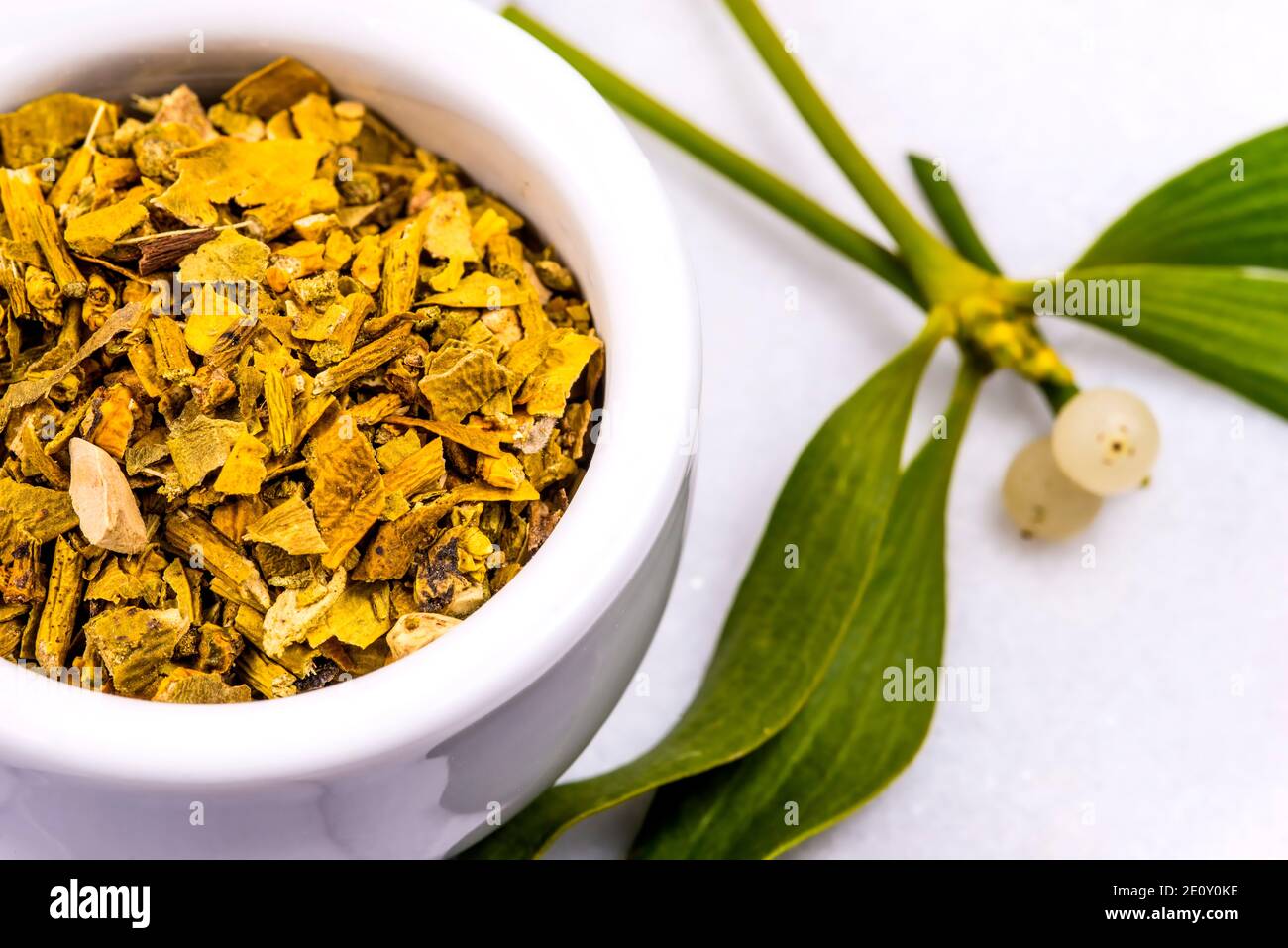Mistletoe, Medicinal Herb Dried And Fresh Leaves With Mortar Stock ...