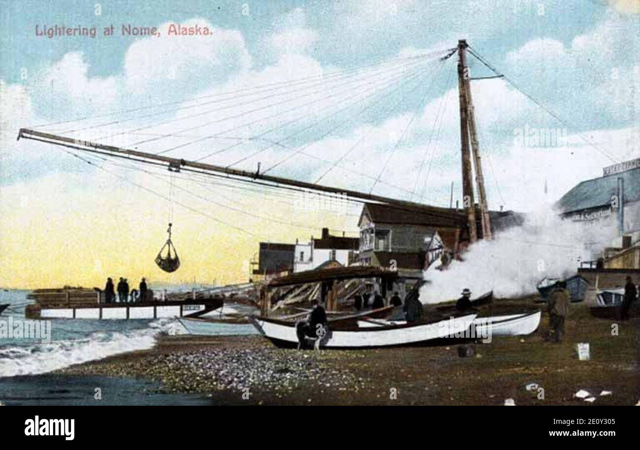 Lightering goods from a scow on the beach for the Northern Commercial ...