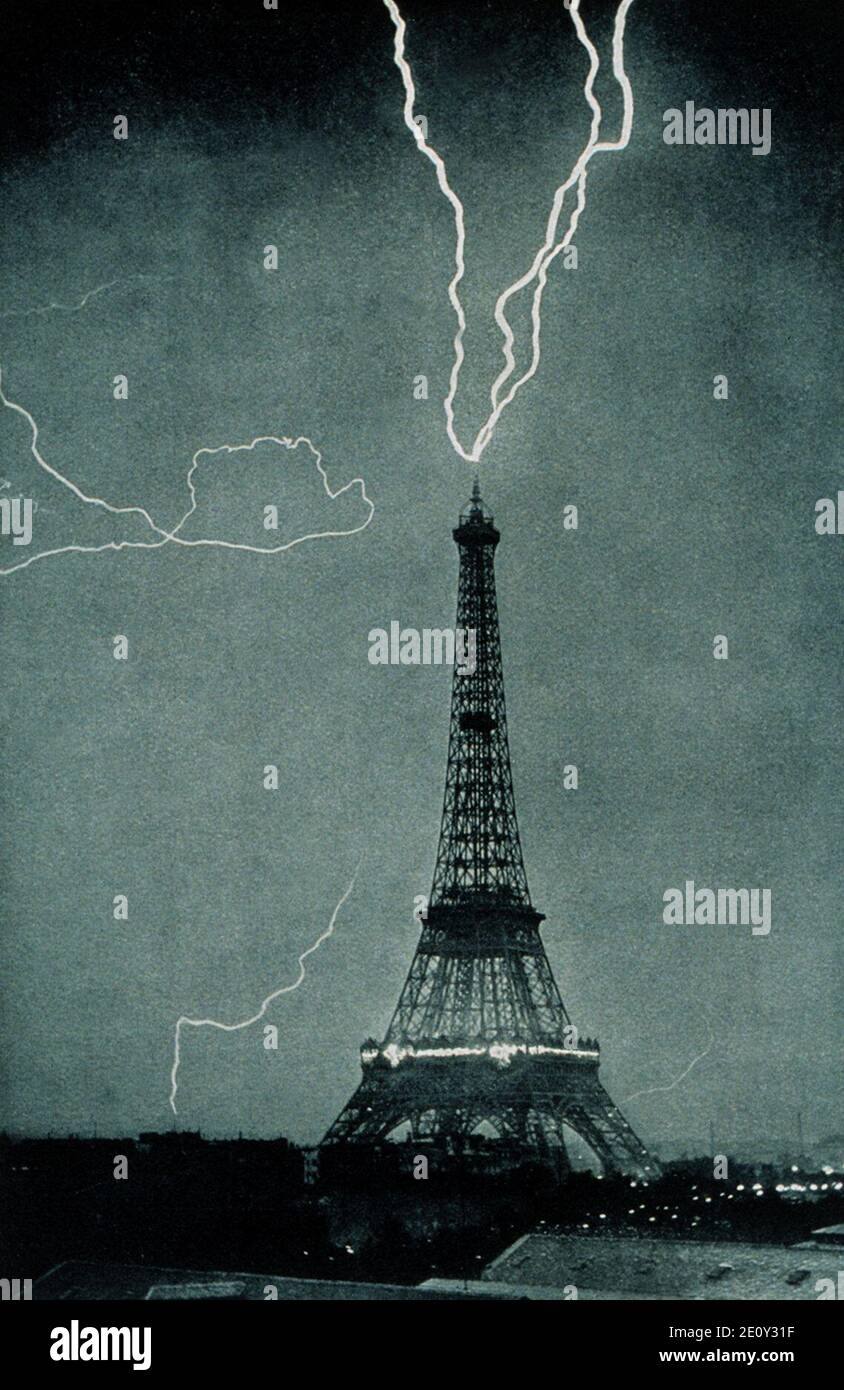 Lightning striking the Eiffel Tower - NOAA edit Stock Photo - Alamy