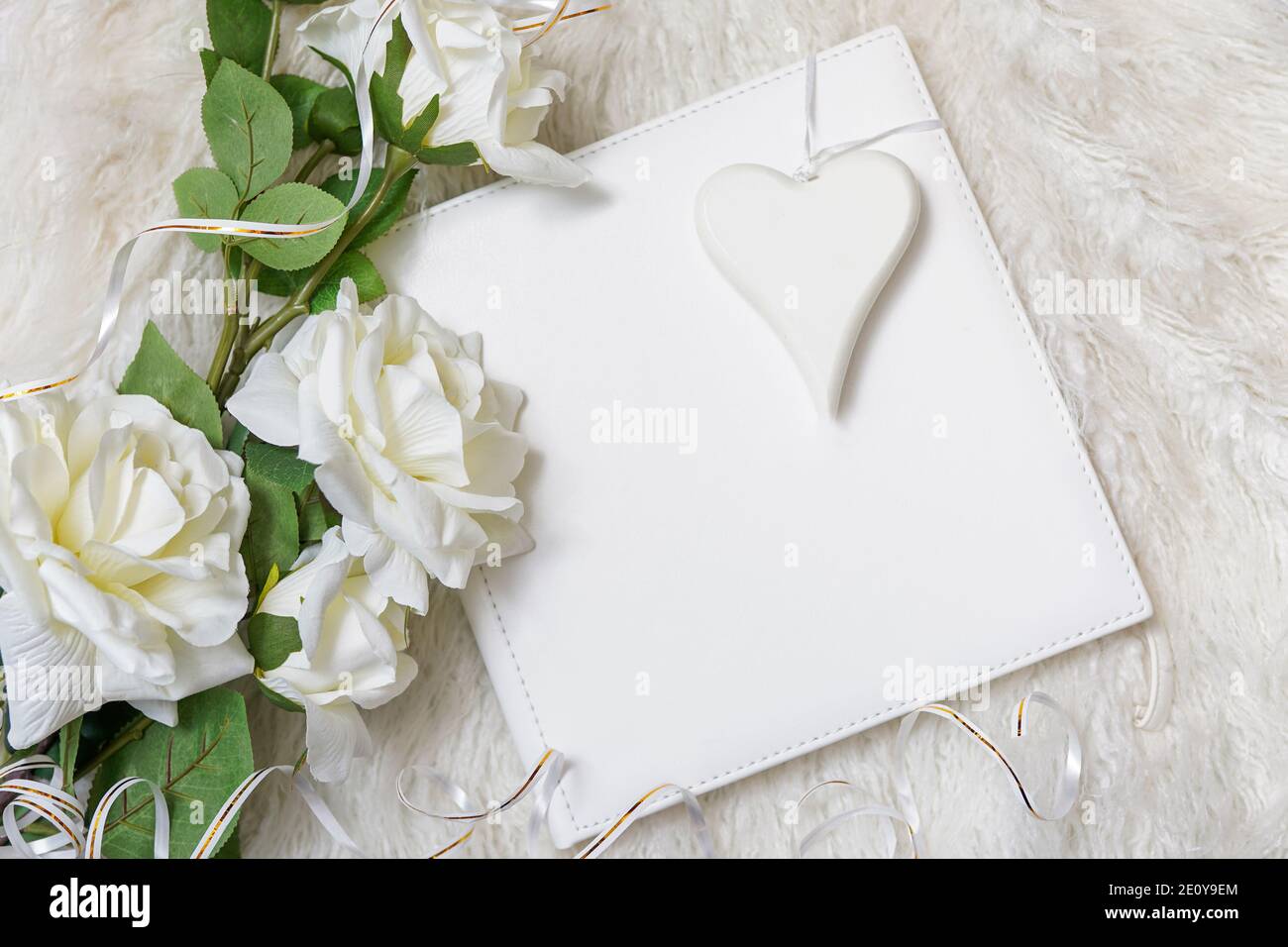 Open book heart pages flower hi-res stock photography and images - Alamy