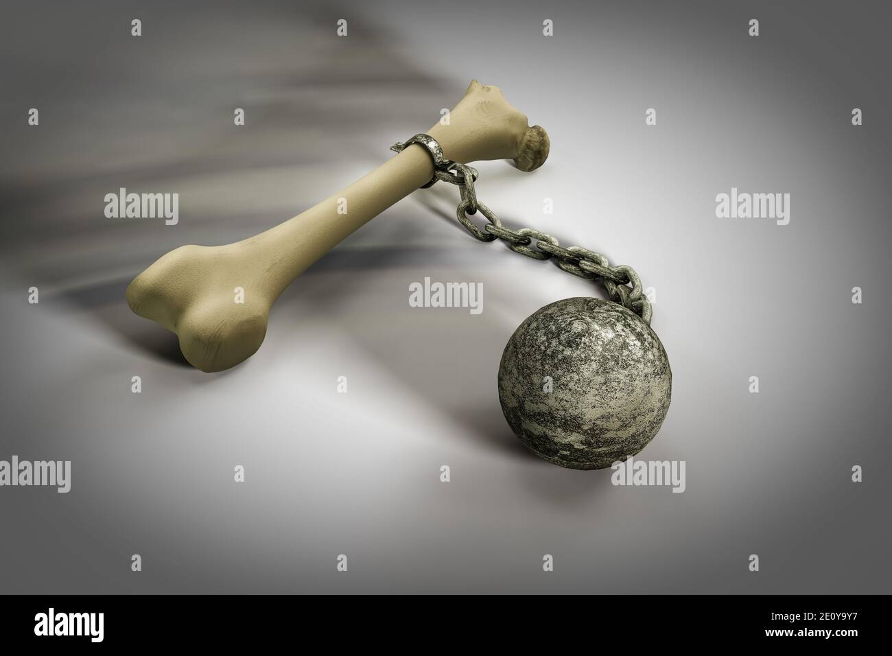 Human thigh bone lock with stone ball in white-grey background ...